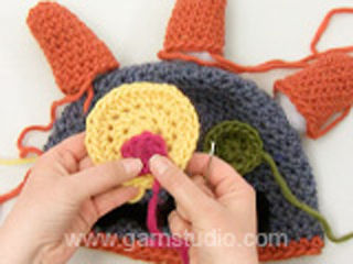 How to crochet a big eye for the hat in DROPS Extra 0-929